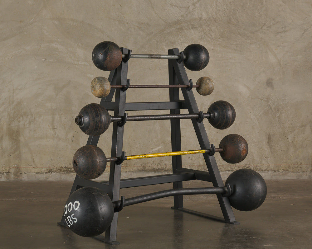 COLLECTION OF ANTIQUE BARBELLS ON STEEL MOUNT – Blackman Cruz