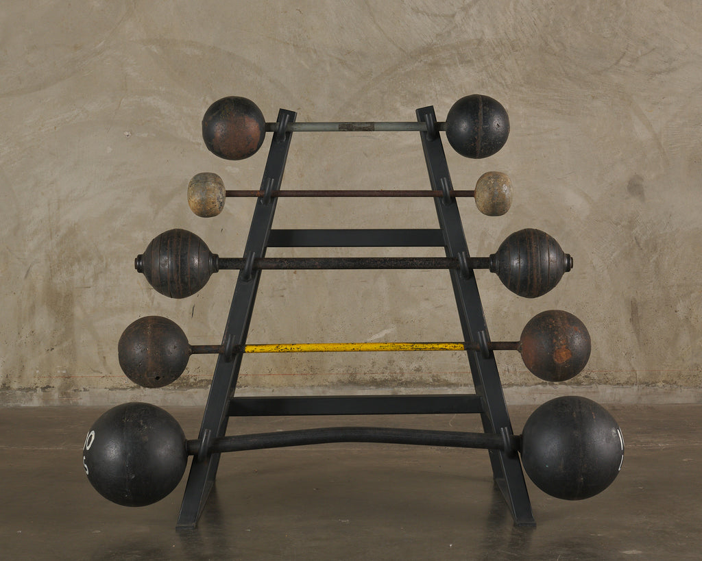 COLLECTION OF ANTIQUE BARBELLS ON STEEL MOUNT – Blackman Cruz